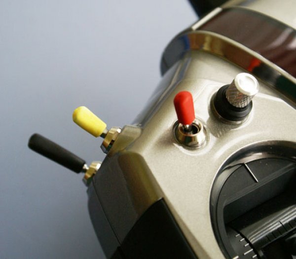 Transmitter switch caps