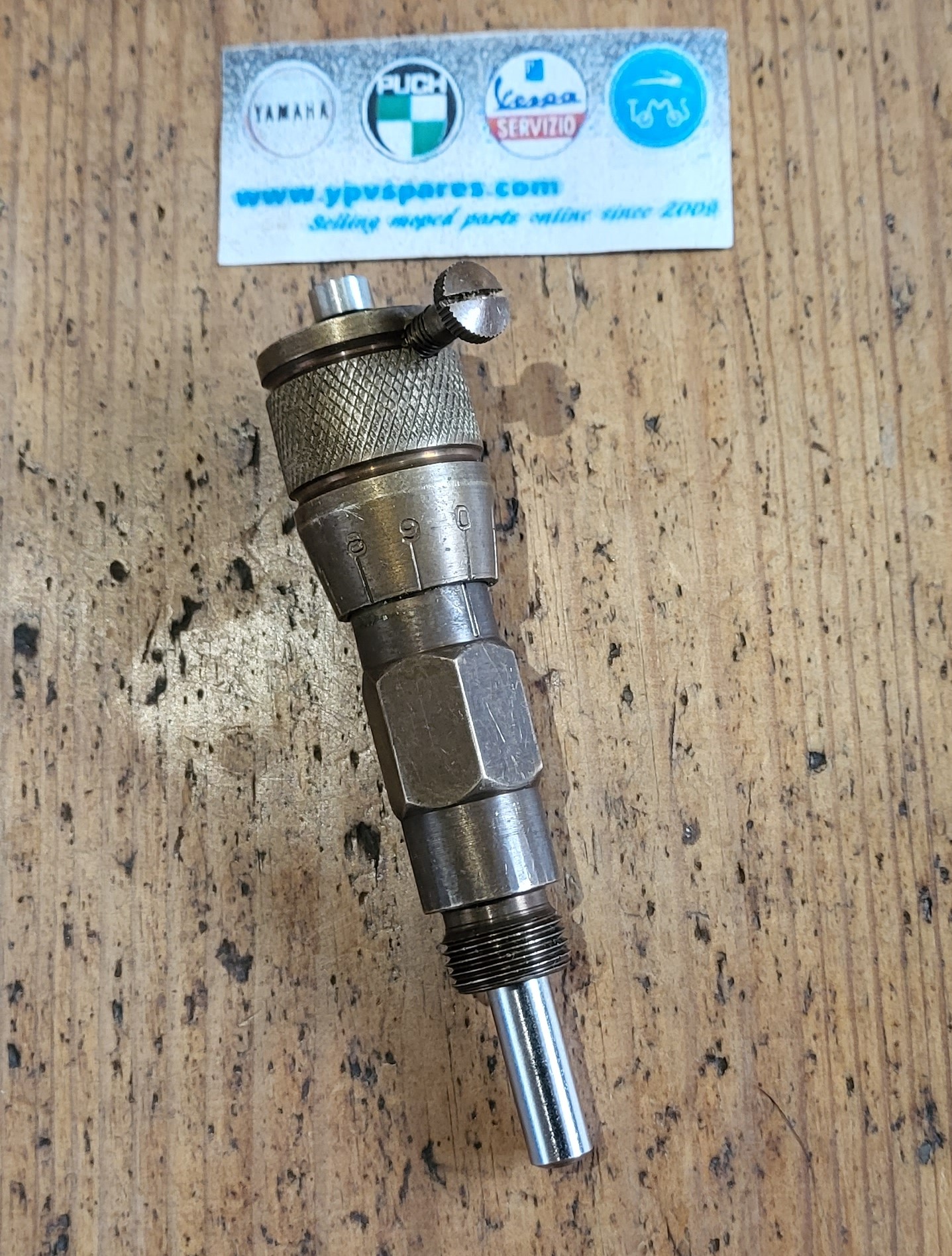 Micrometer timing tool for 14mm spark plug hole.