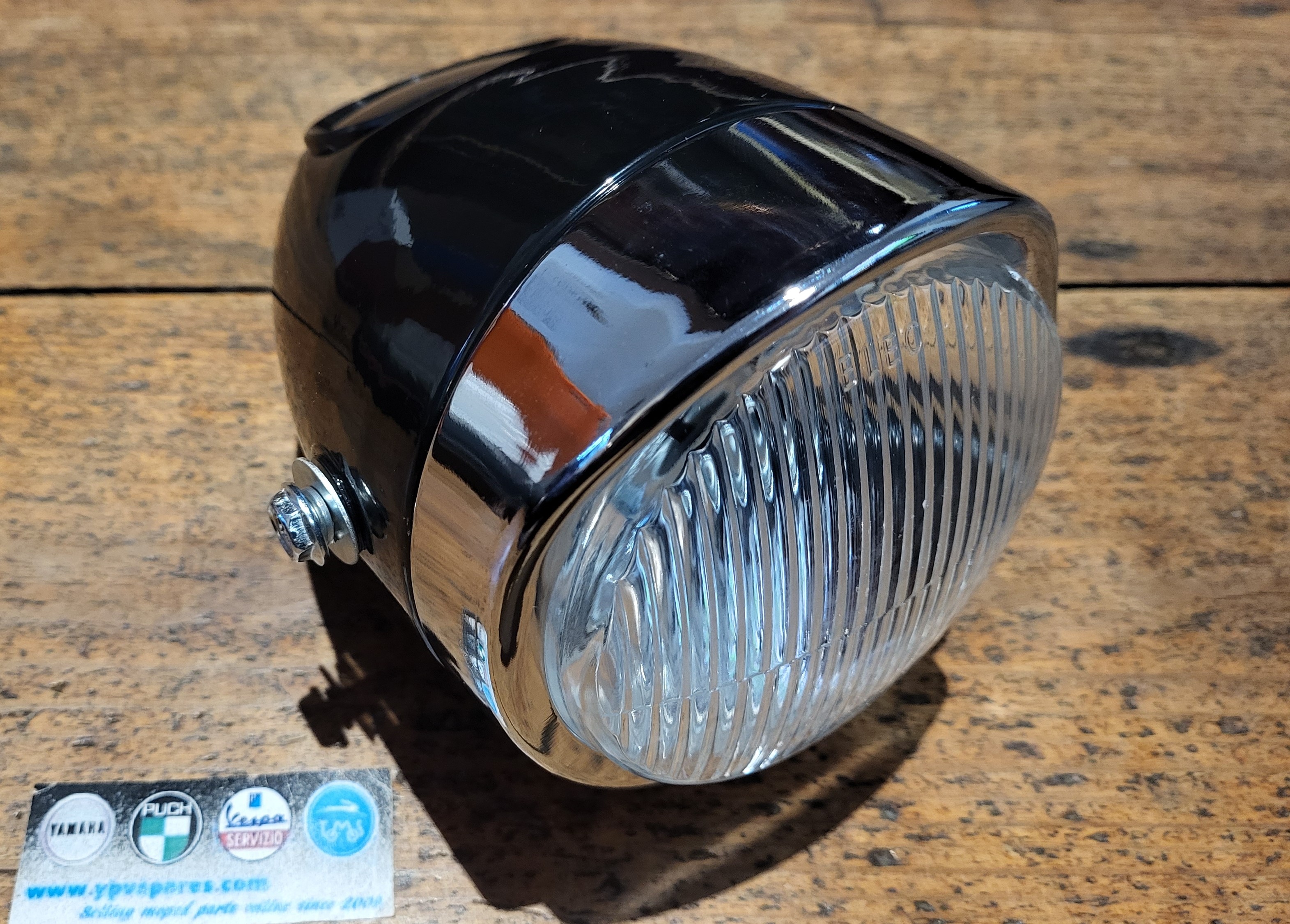Black side mount 105mm bullet headlight.