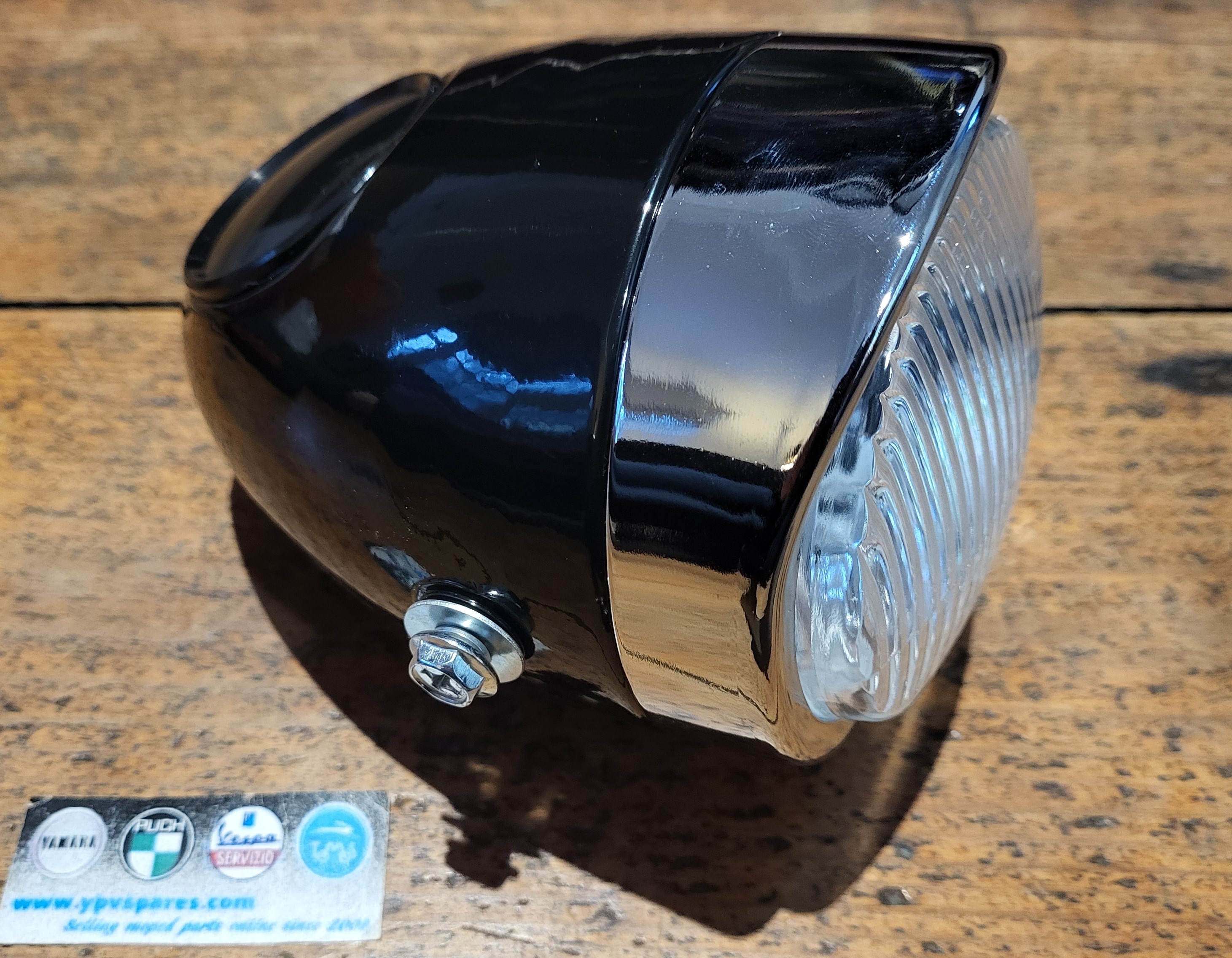 Black side mount 105mm bullet headlight.