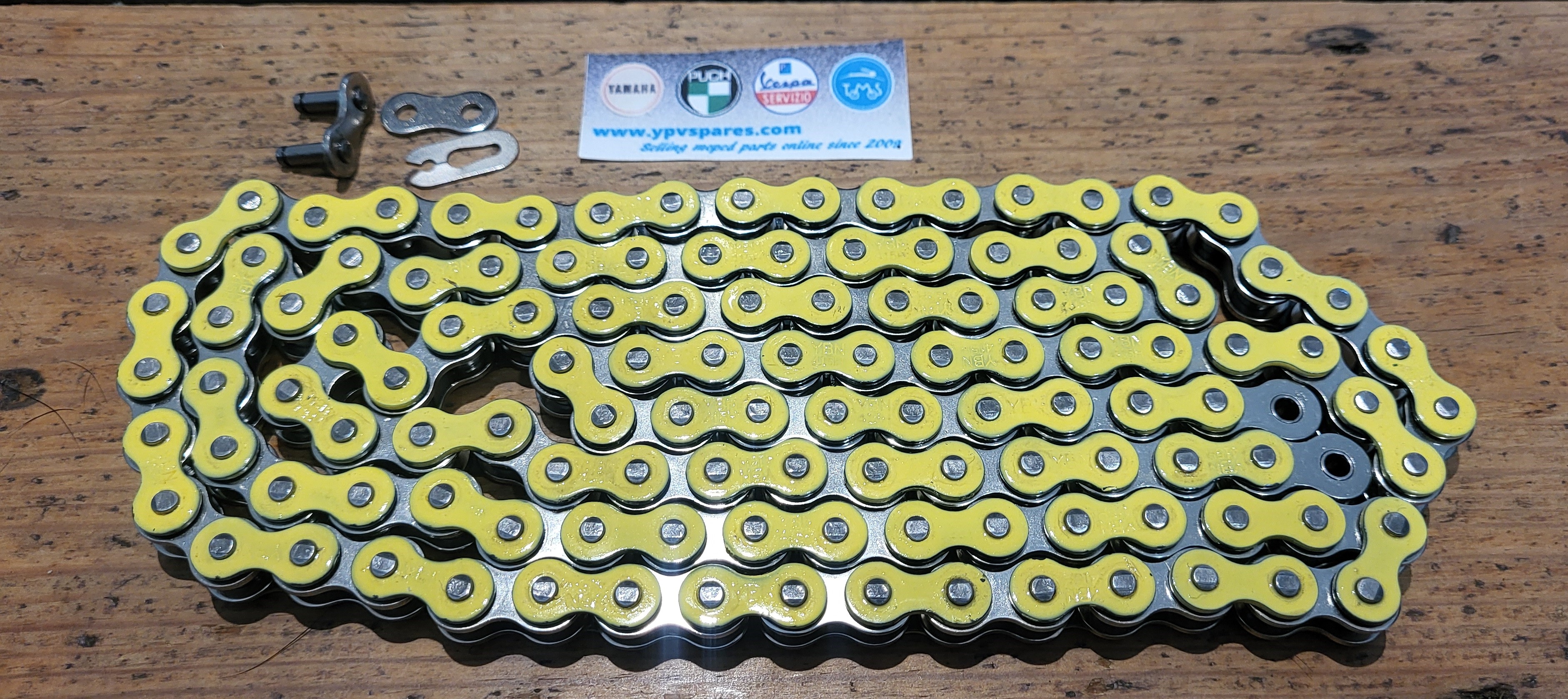 415H yellow YBN 122 link drive chain.