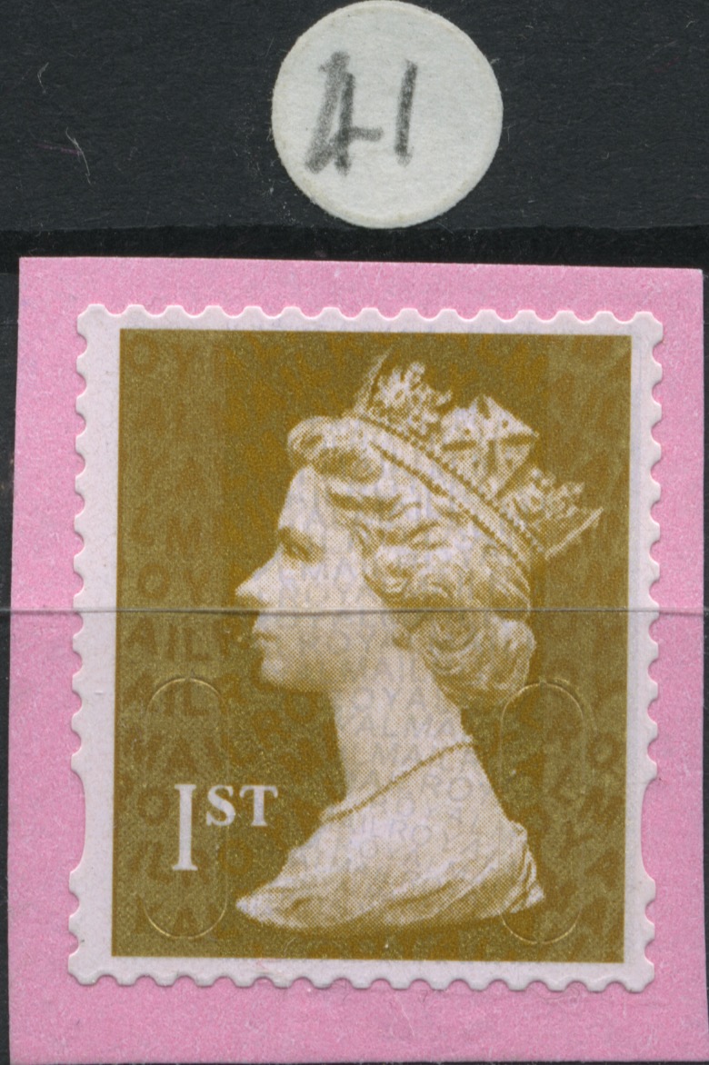 Forged Machin 1st class gold stamp, used on paper