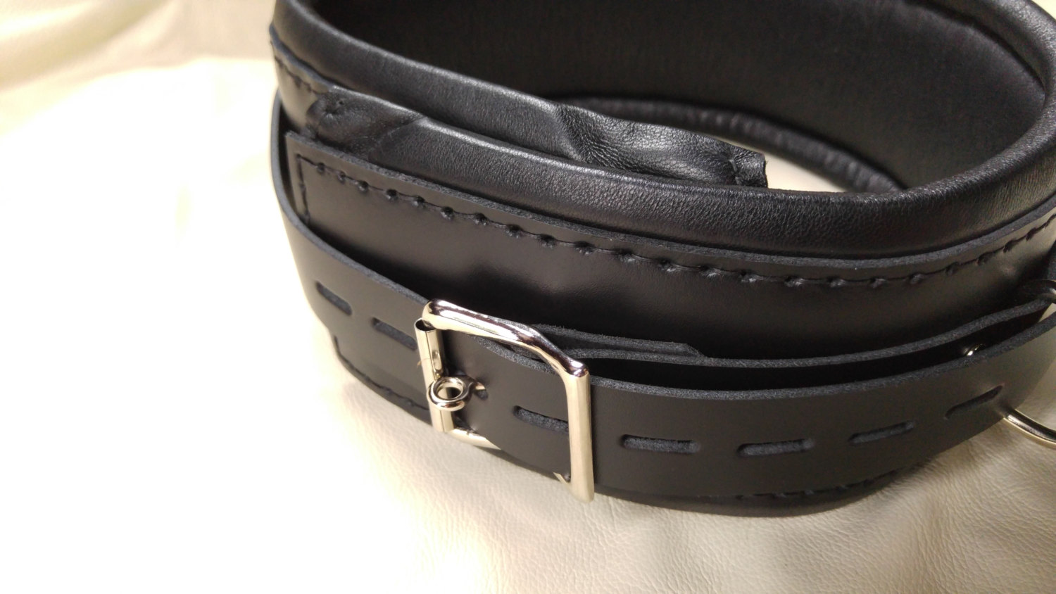 Quality Black bondage cuffs. Lamb leather lined, lifetime quality.