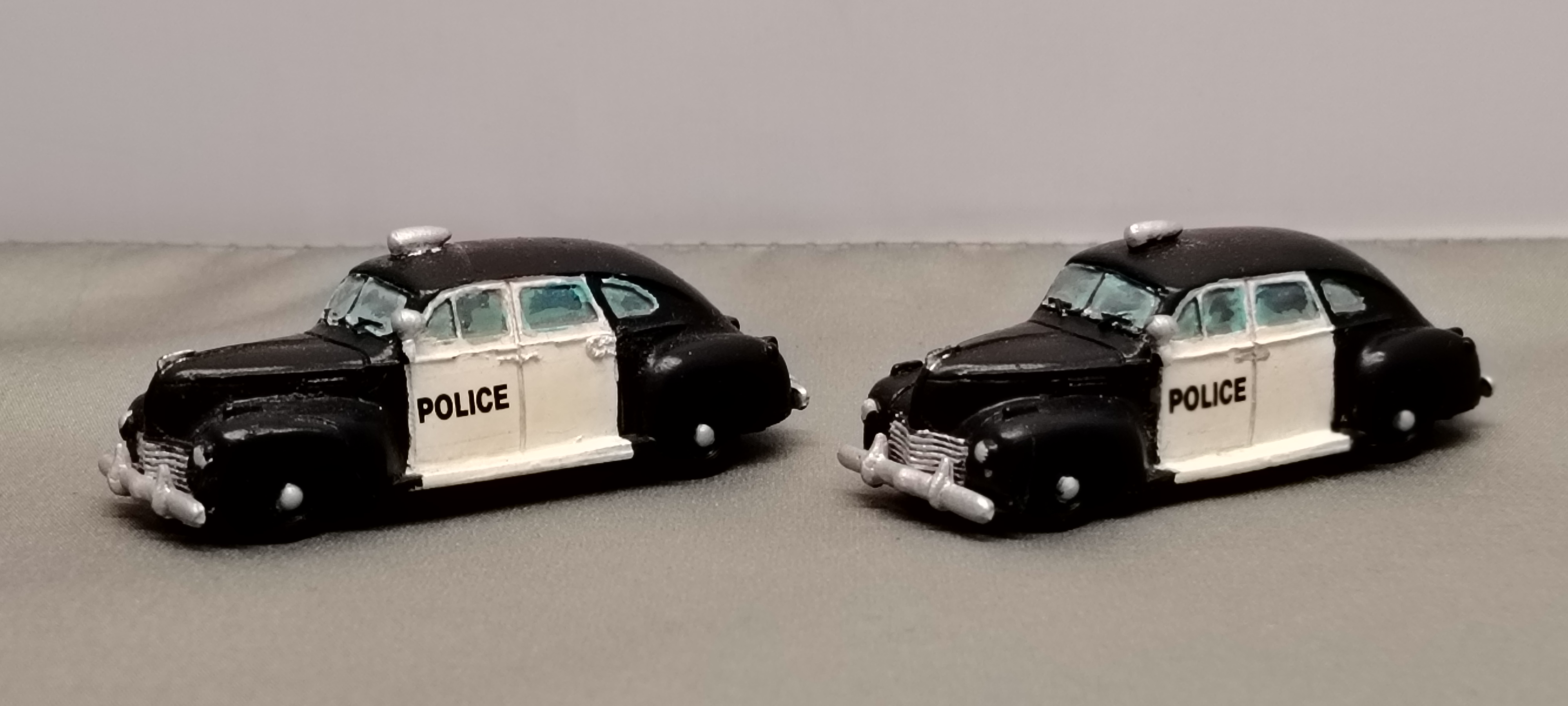 Pre owned HO. PO(MB3). 2 unboxed early American police cars built from ...