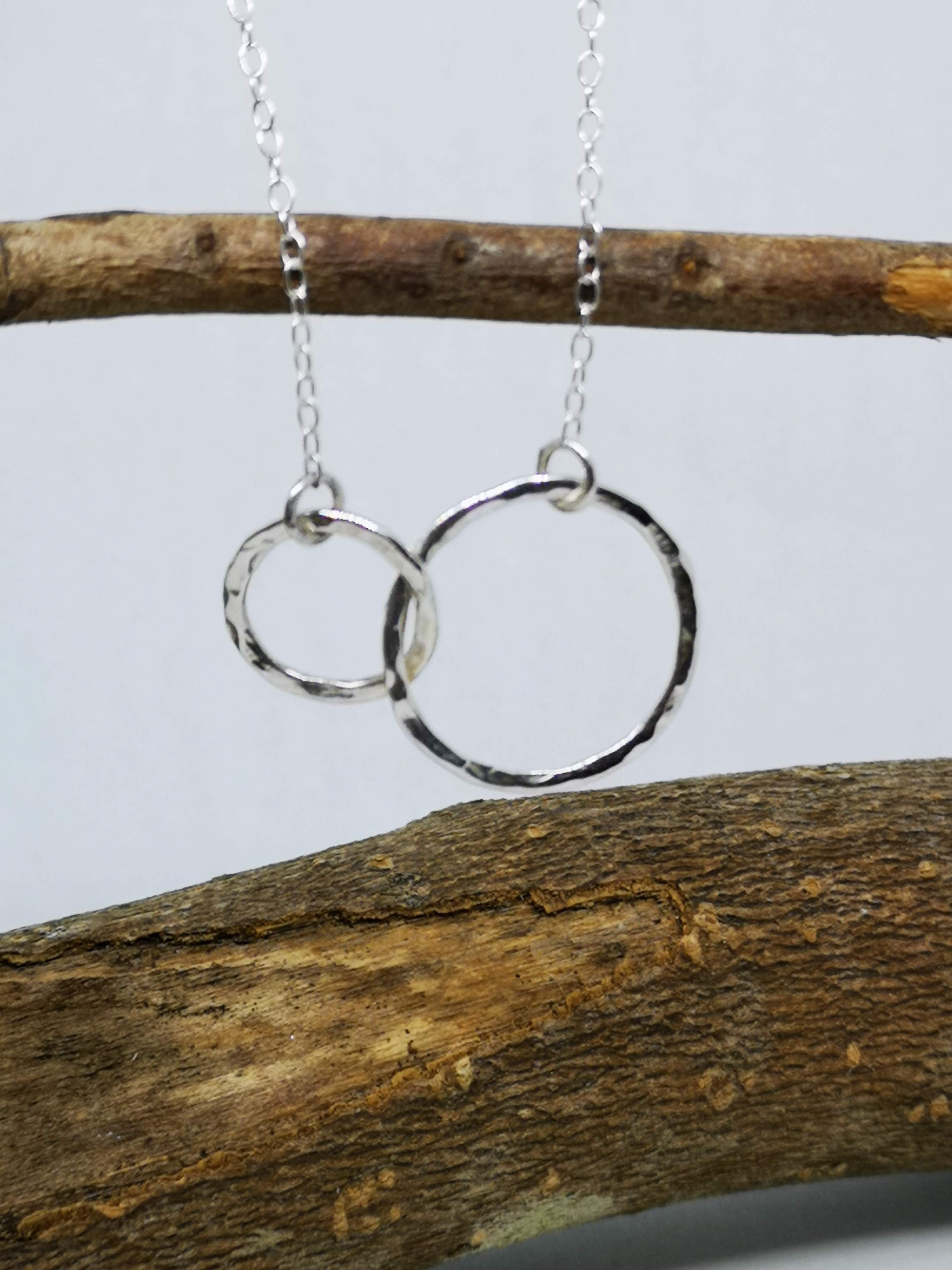 Hammered double linked big/small rings