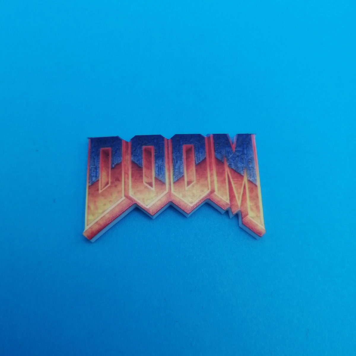 DOOM logo pin badge