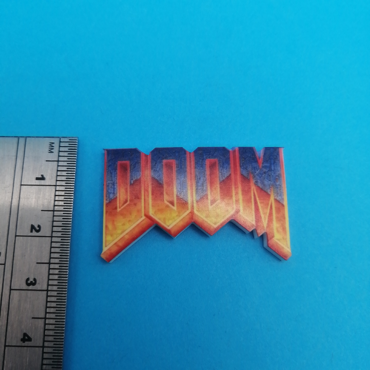 DOOM logo pin badge