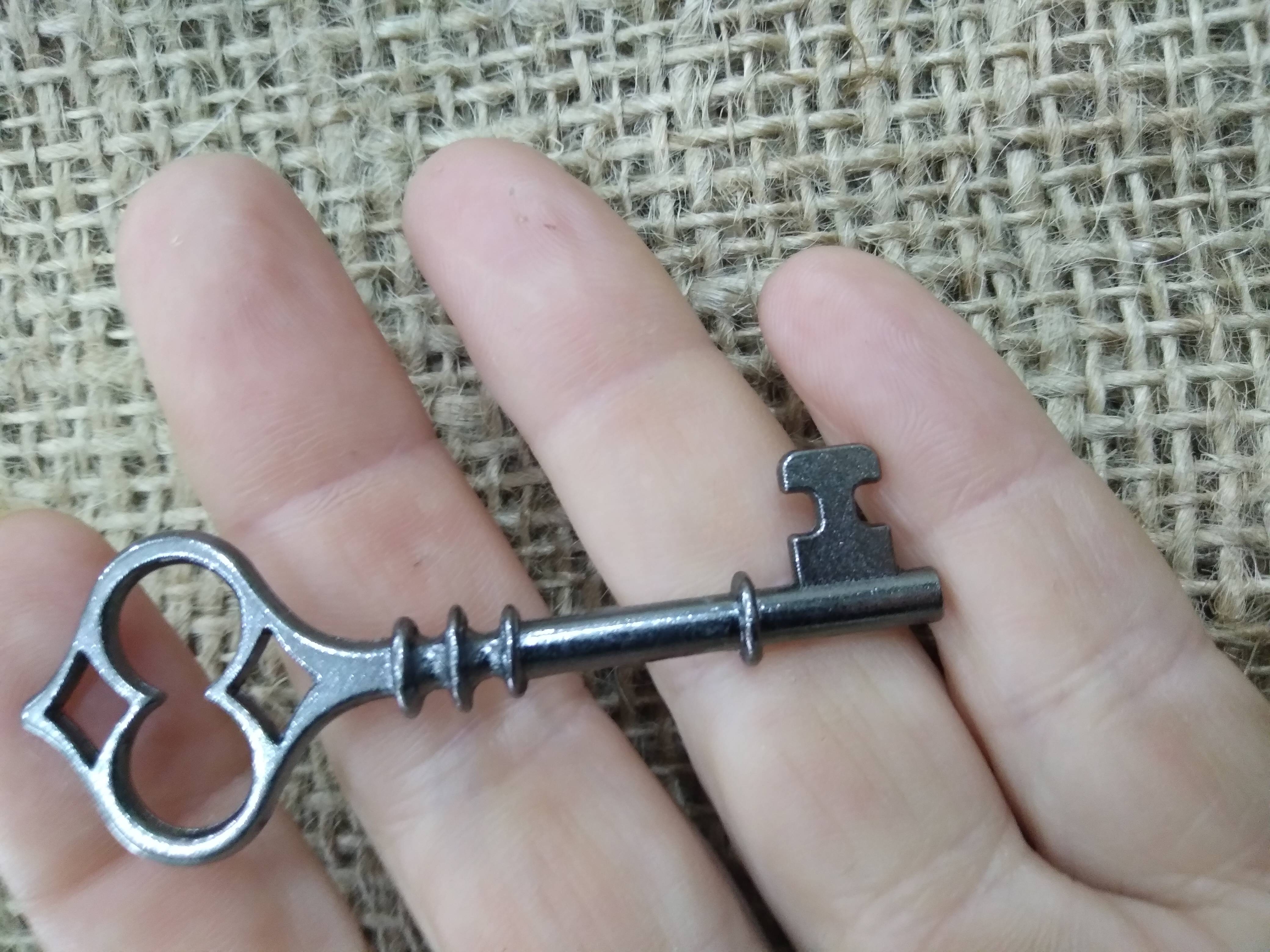 black colour metal key, prop, crafting supplies